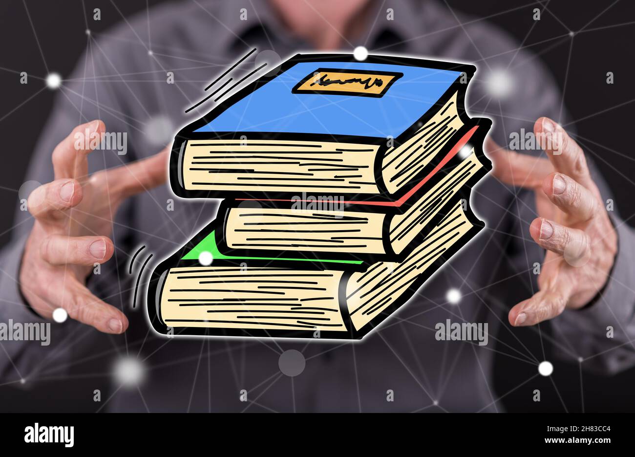 Education concept between hands of a man in background Stock Photo - Alamy