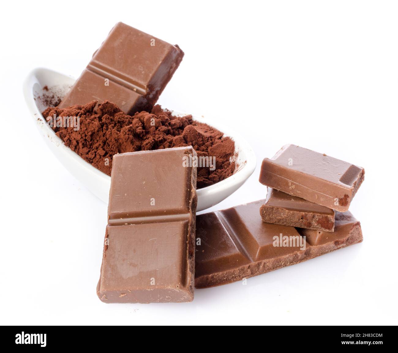 Chocolate squares and cocoa powder, isolated on white Stock Photo - Alamy
