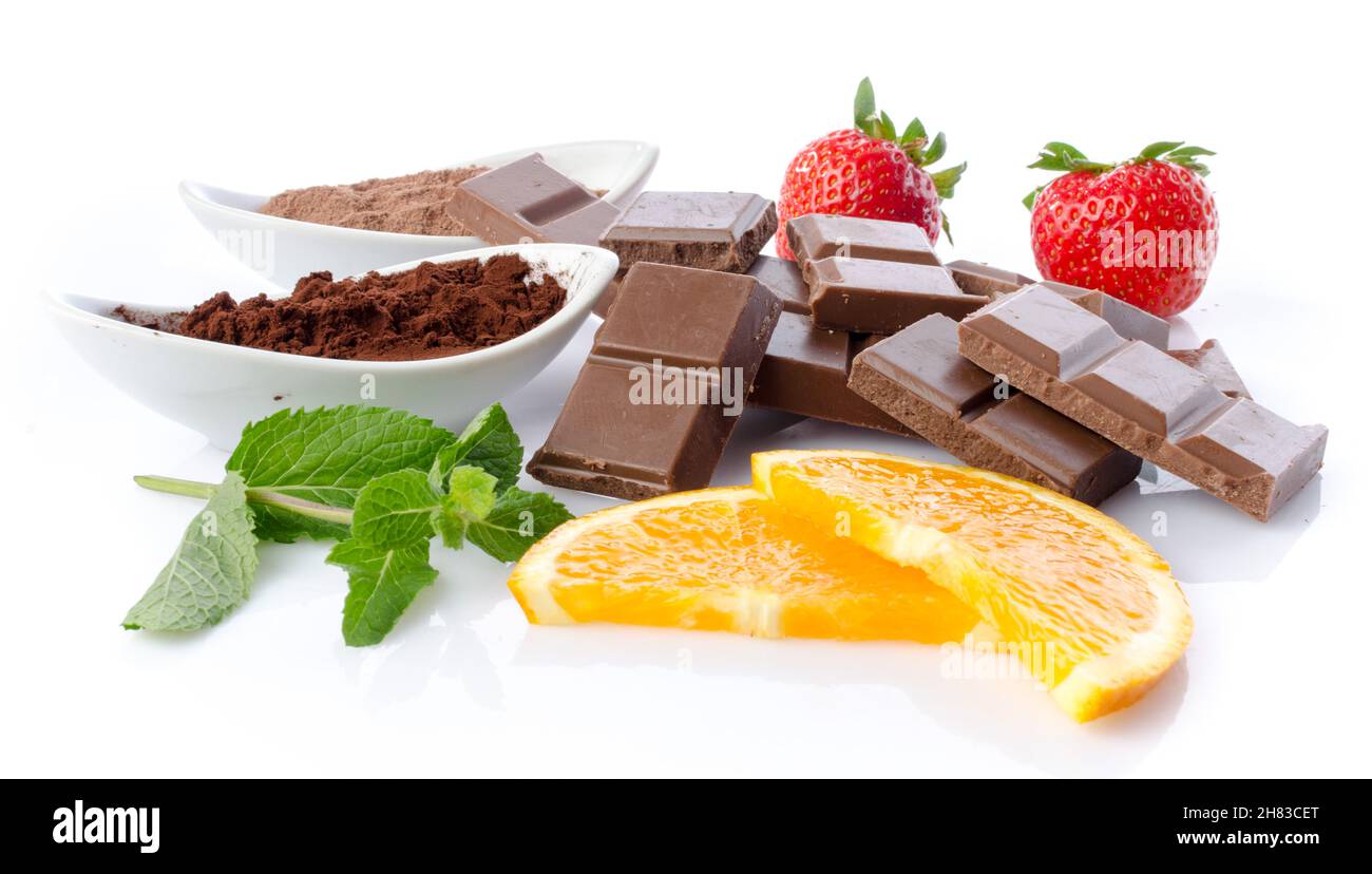 Chocolate squares and cocoa powder, isolated on white Stock Photo - Alamy