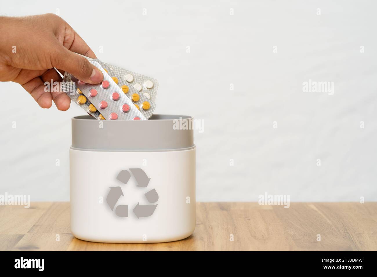 Full of expired pills and medicines in the trash bin with recycling ...