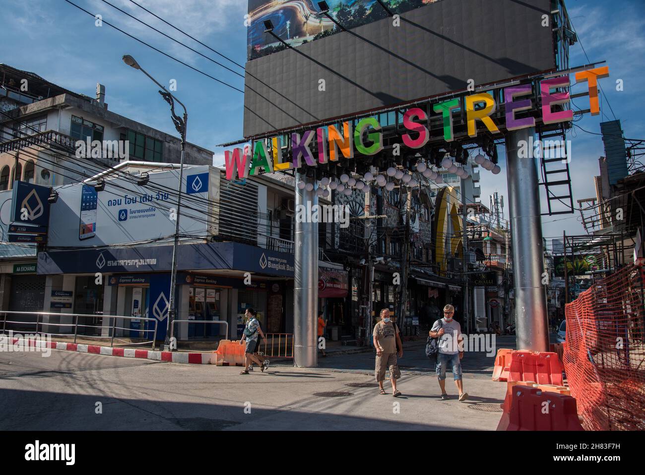 Pattaya, Thailand. 27th Nov, 2021. Tourists seen walking in front of ...