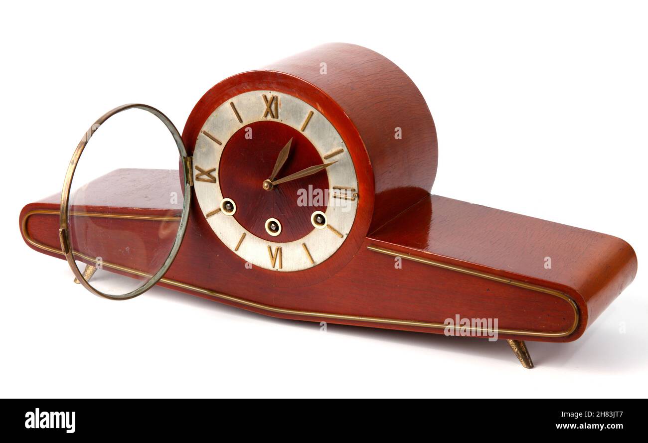 Hand carved clock Cut Out Stock Images & Pictures - Alamy