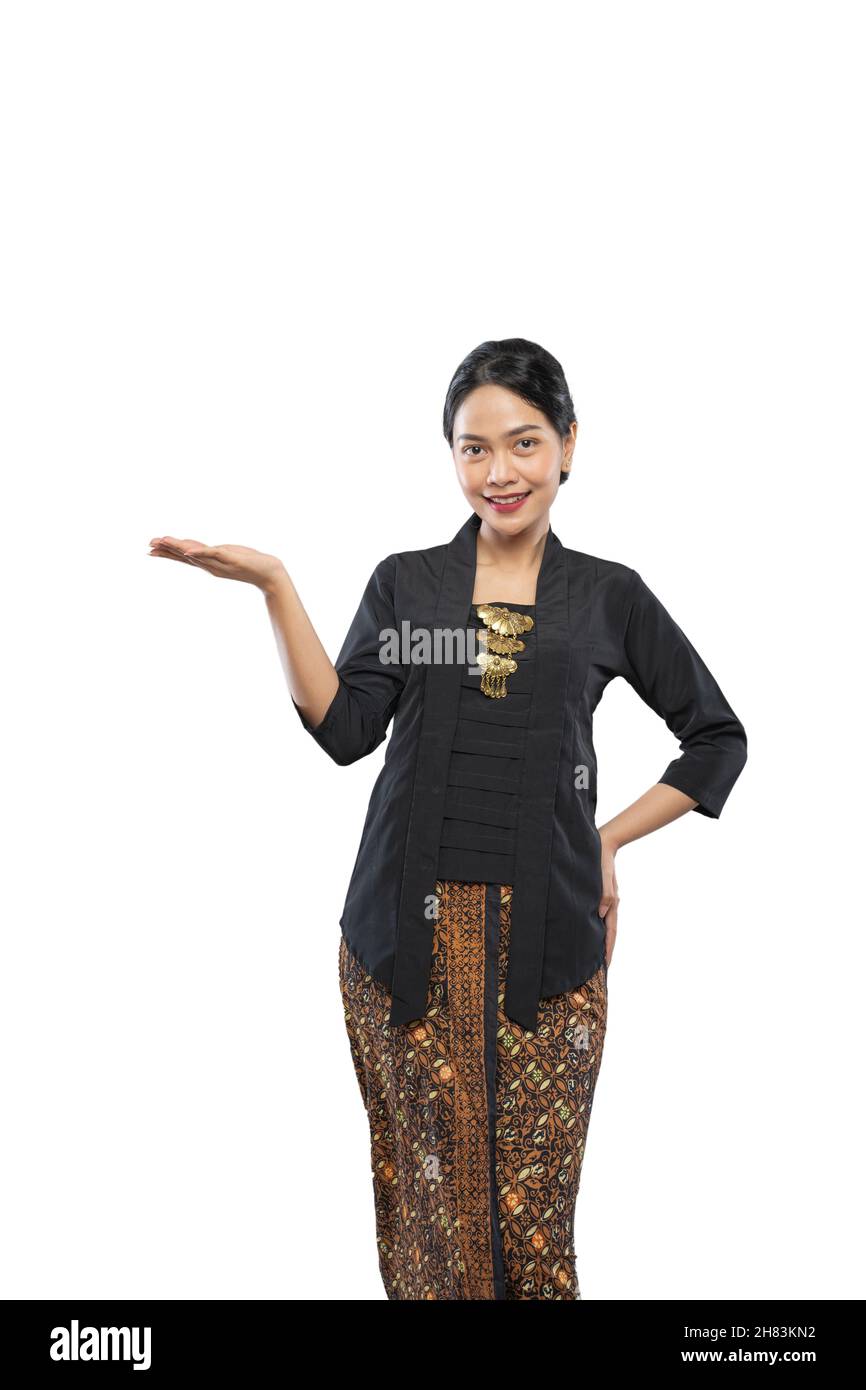beautiful woman wearing traditional Javanese clothes presenting Stock ...