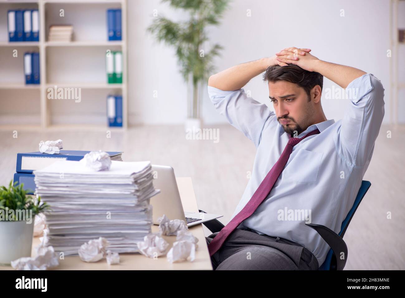 Young businessman employee in rejected ideas concept Stock Photo - Alamy
