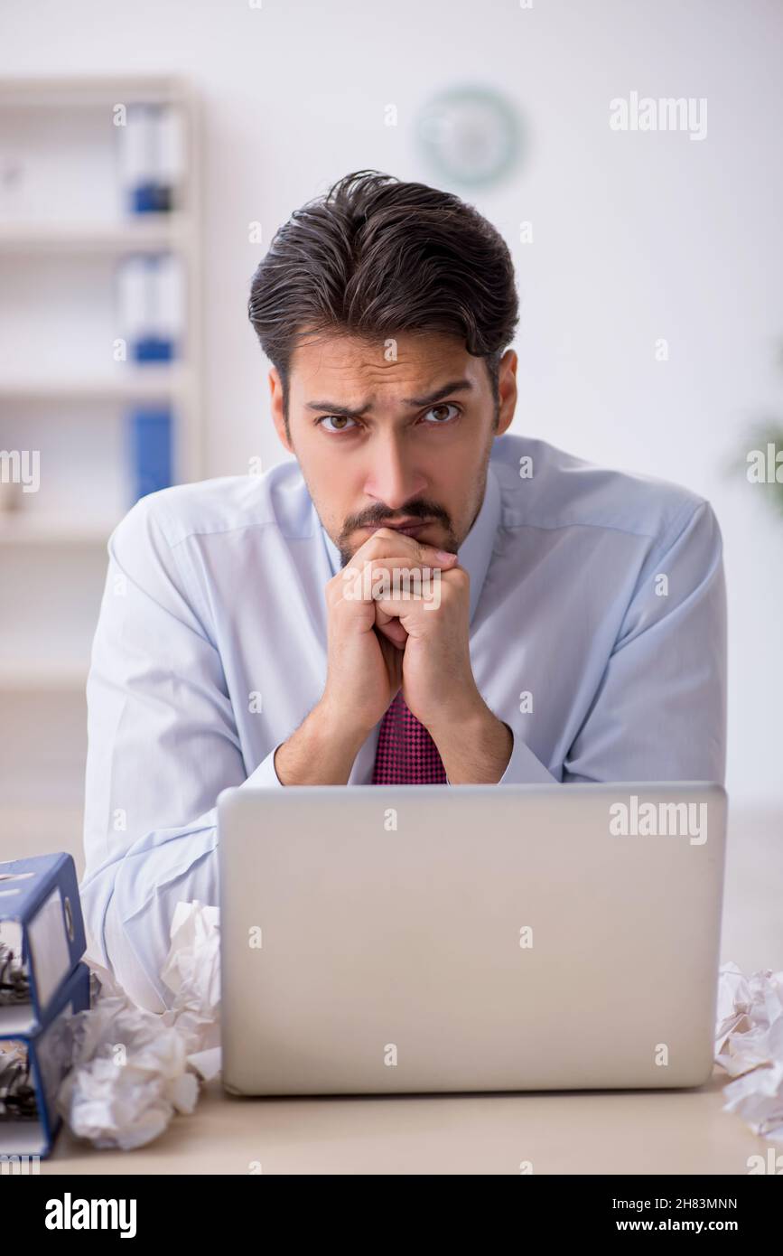 Young businessman employee in rejected ideas concept Stock Photo - Alamy