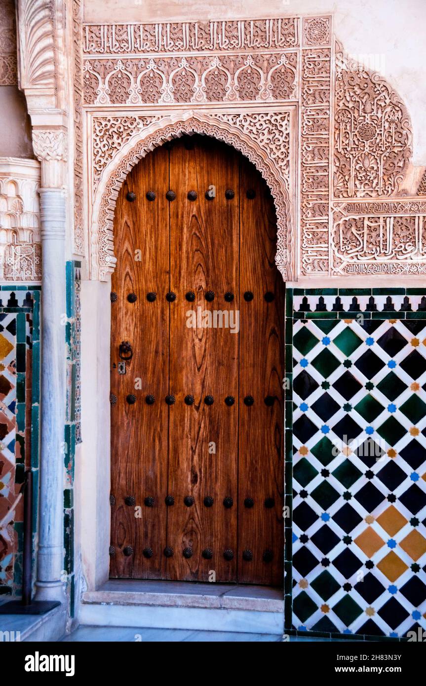 Calligraphy, arabesque, and mosaic tiles or Alicatado at the Alhambra ...