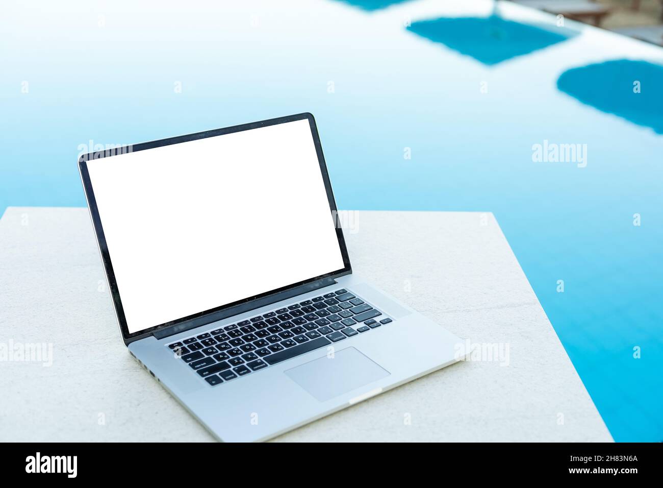 computer on table background as a pool Stock Photo - Alamy