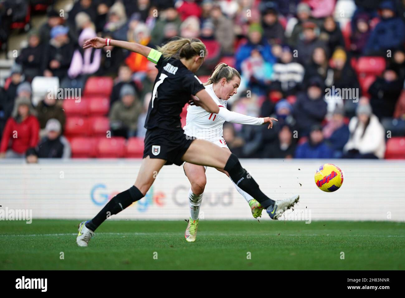 England's Lauren Hemp (right) has a shot on goal during the FIFA Women ...