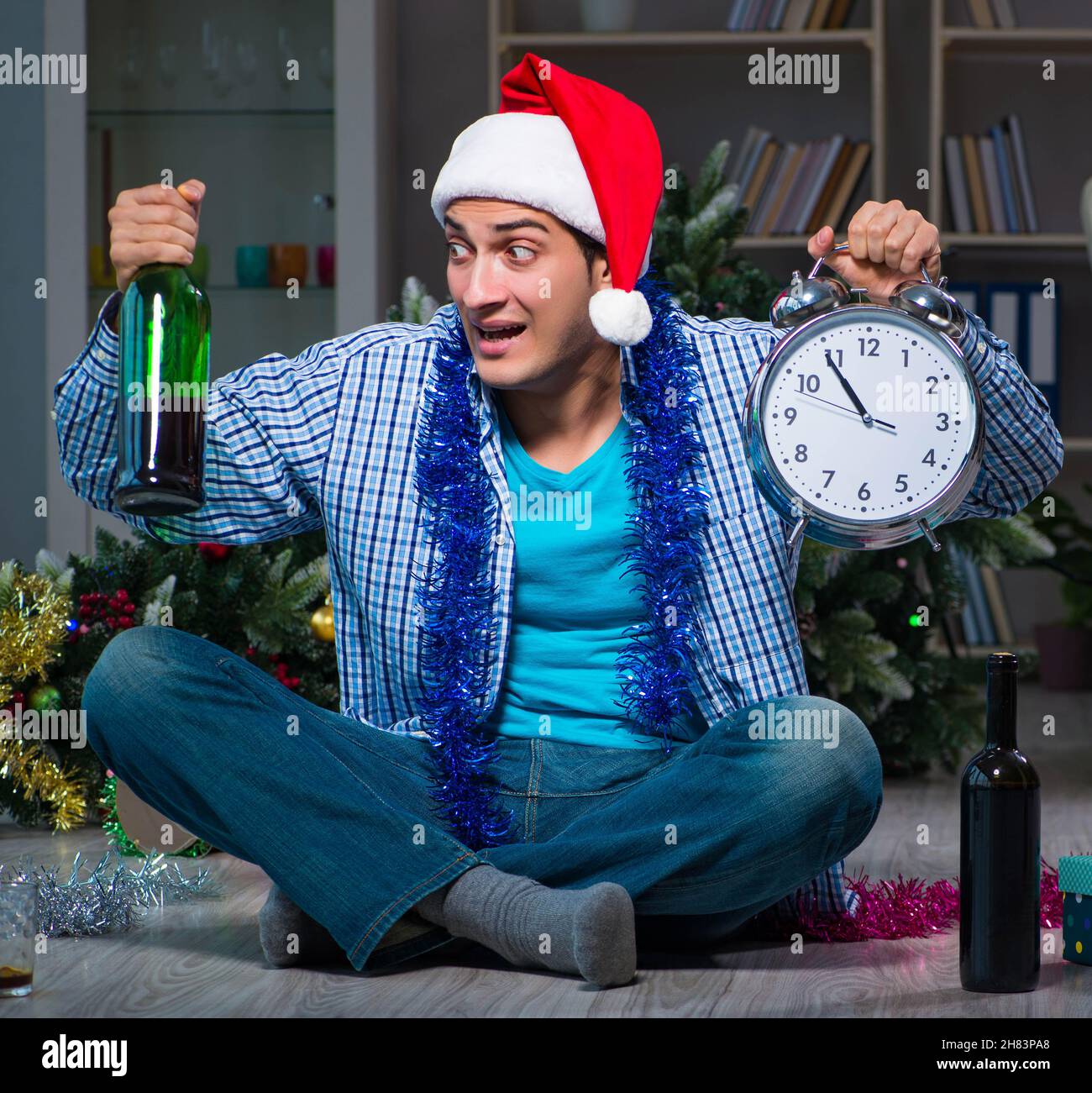 The man celebrating christmas at home alone Stock Photo - Alamy