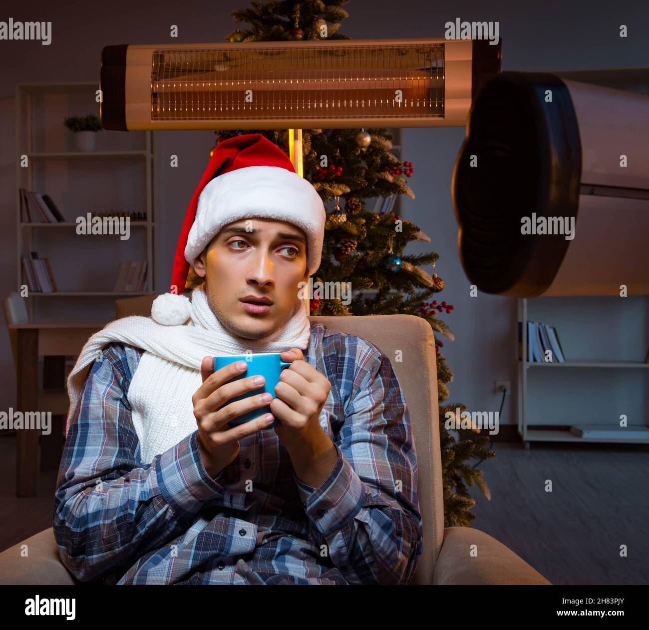 The man suffering from cold at home Stock Photo - Alamy