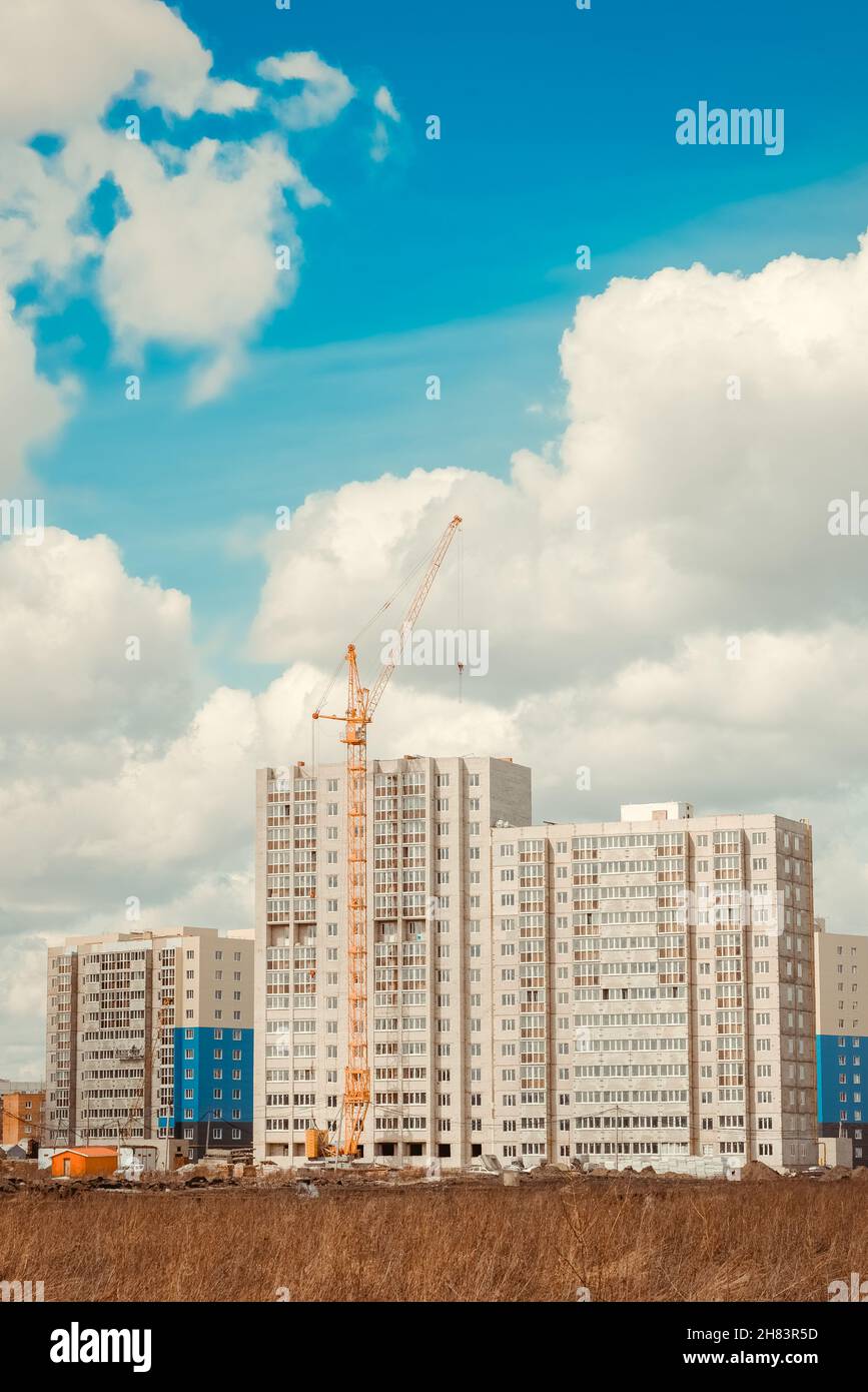 Crane and construction of new apartments Stock Photo - Alamy