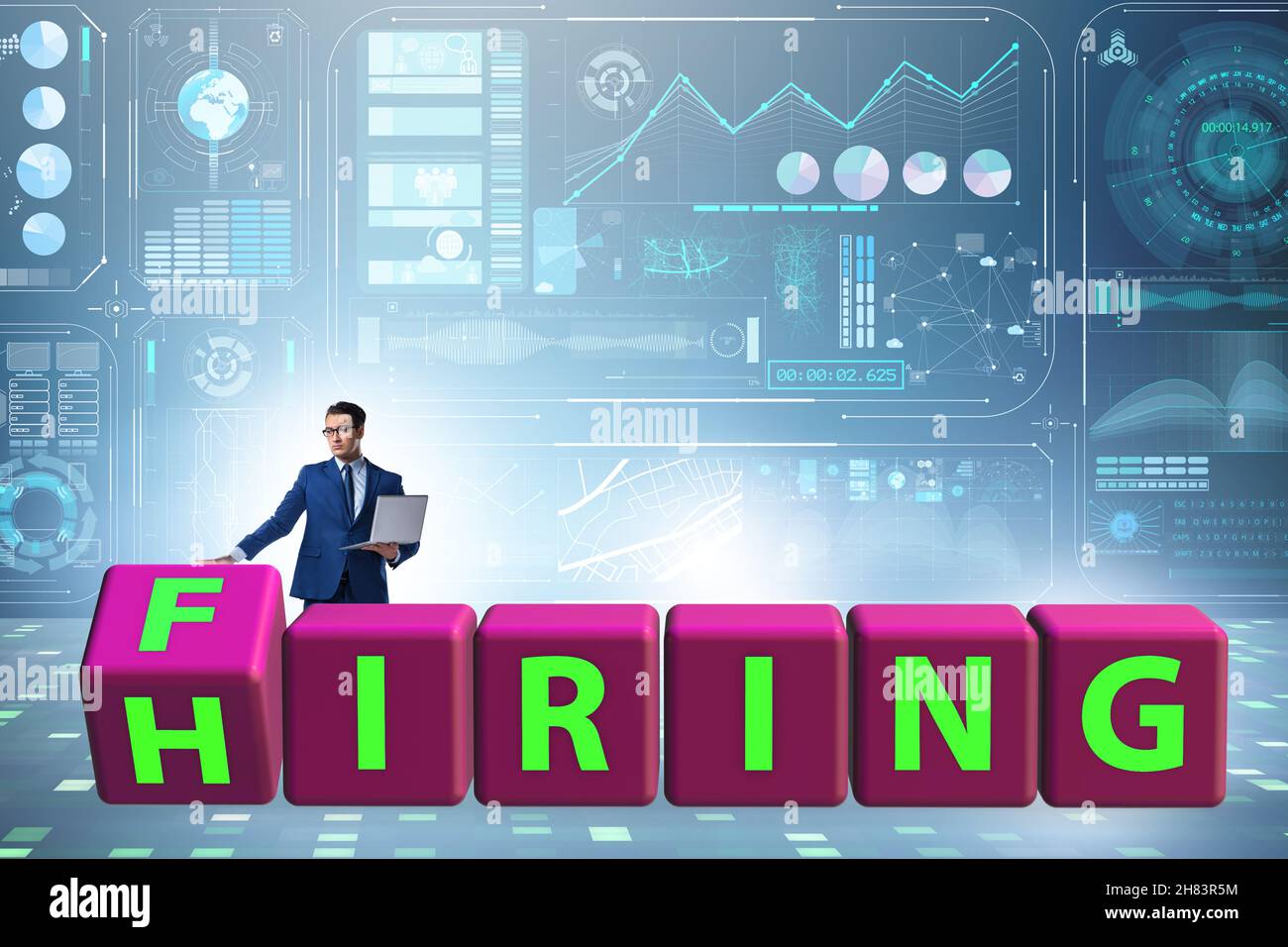 Hiring and firing concept with the turning cubes Stock Photo - Alamy