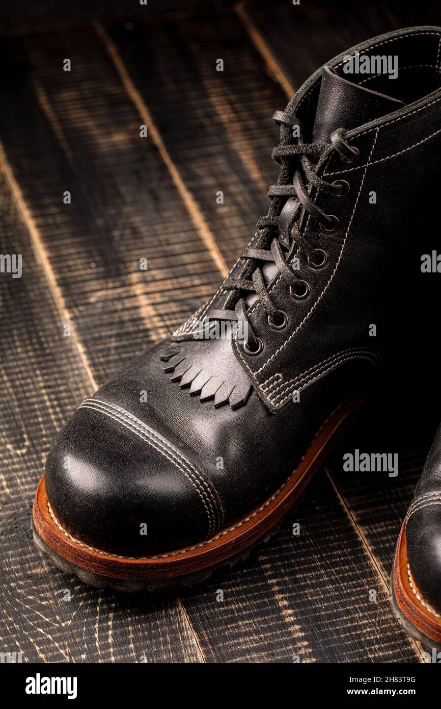 Black shiny boots hi-res stock photography and images - Alamy