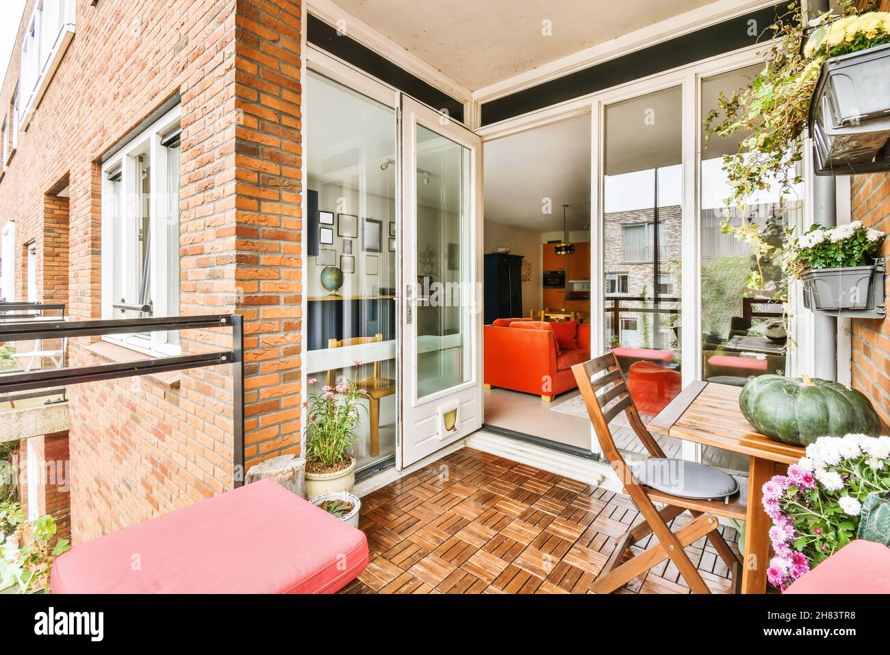 Stylish and cozy balcony with many colors Stock Photo - Alamy