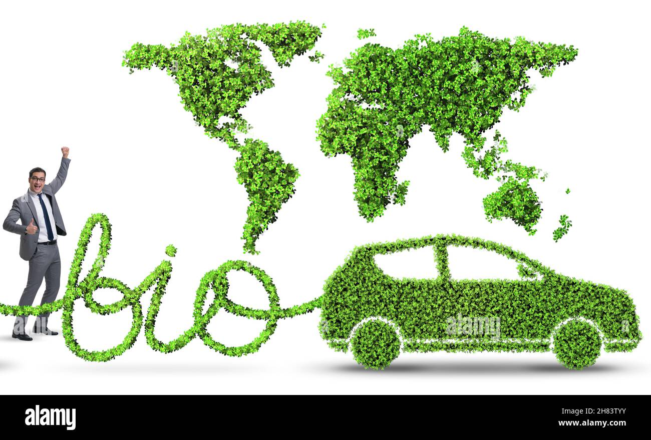 Businessman with car powered with the biofuel Stock Photo - Alamy