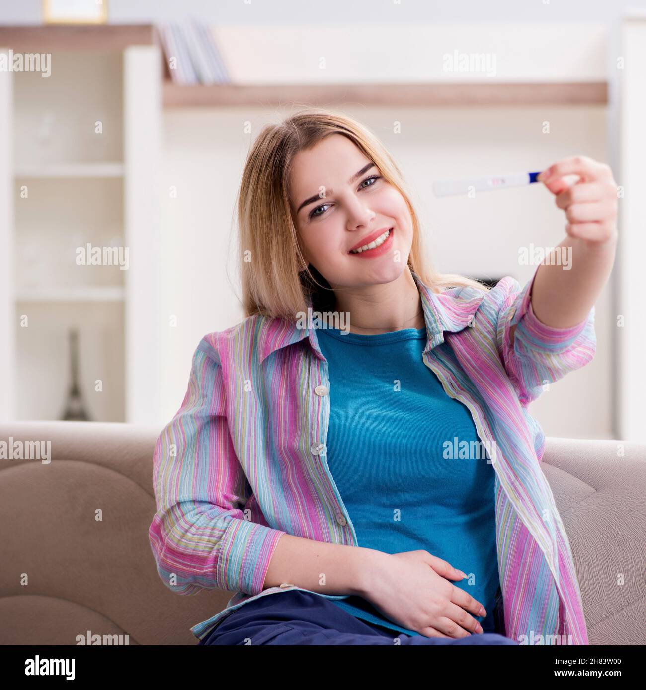 The young woman finding out about her pregnancy Stock Photo - Alamy