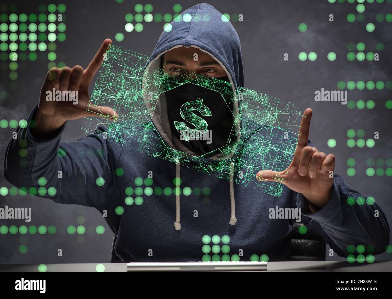The hacker stealing dollars from bank Stock Photo - Alamy