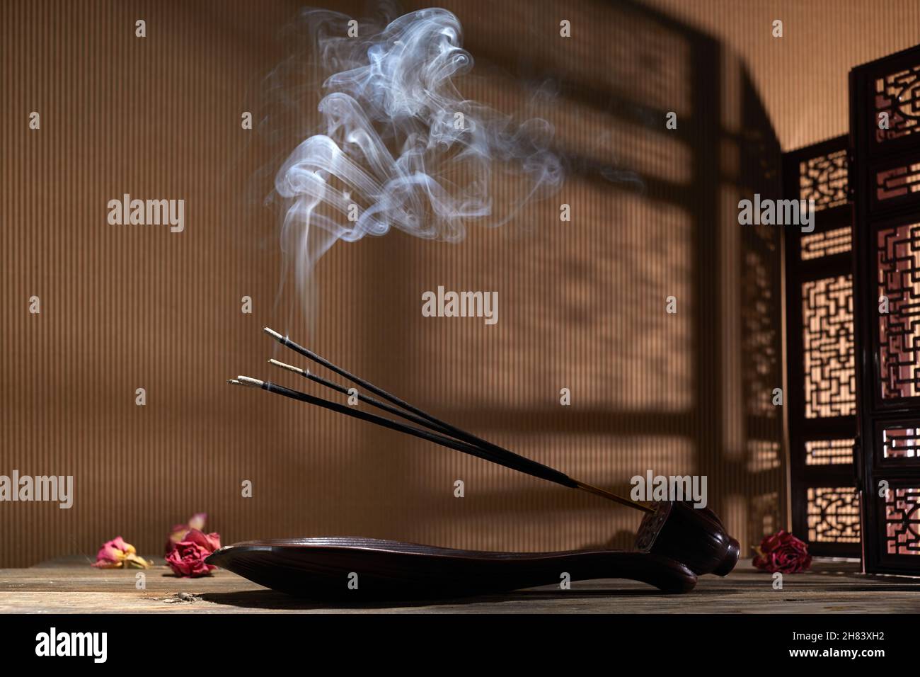 Joss stick incense burn burning smoke hi-res stock photography and ...