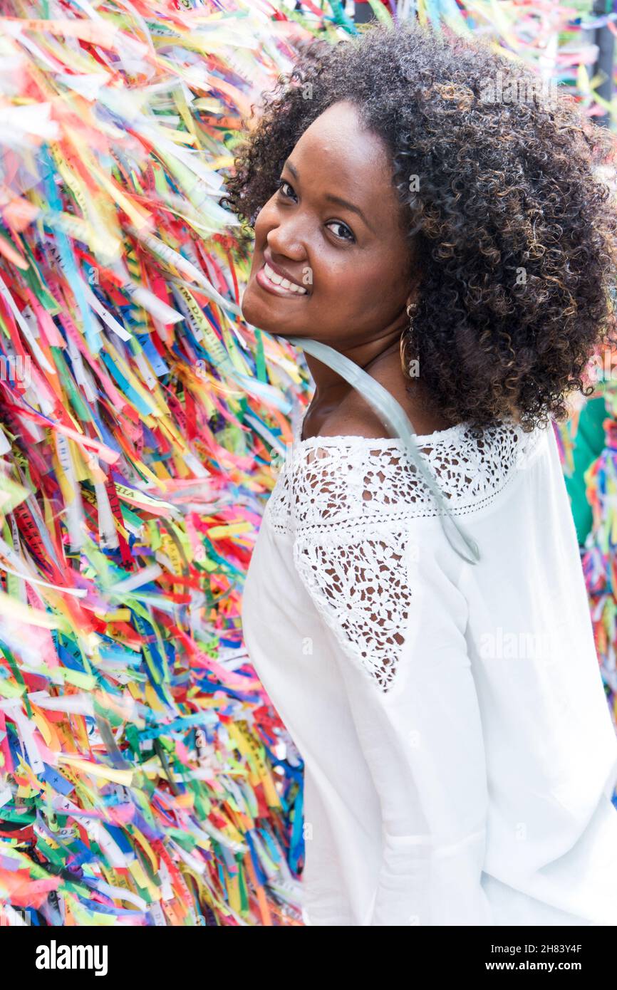 Portrait of a model smiling against colorful background. Salvador ...