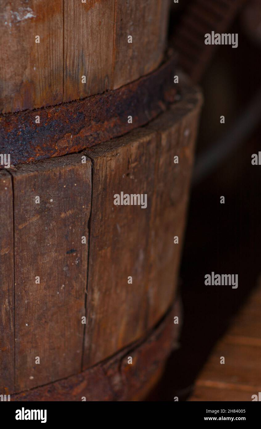 Old and worn wooden buckets with rusty metal hoops Stock Photo - Alamy