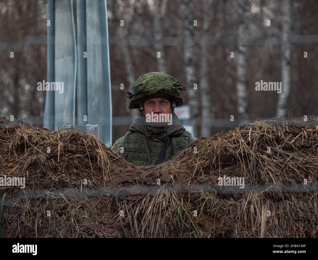 Kazan, Russia. 08 November 2021. A soldier on duty in a trench at a peacekeeping post. The line ...