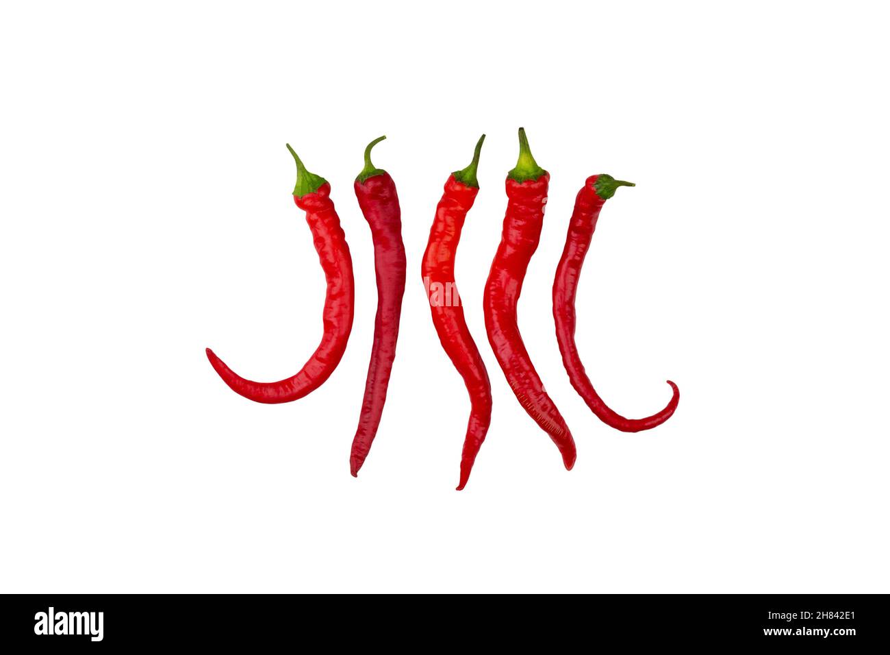 five large red hot chili peppers isolated on a white background Stock ...