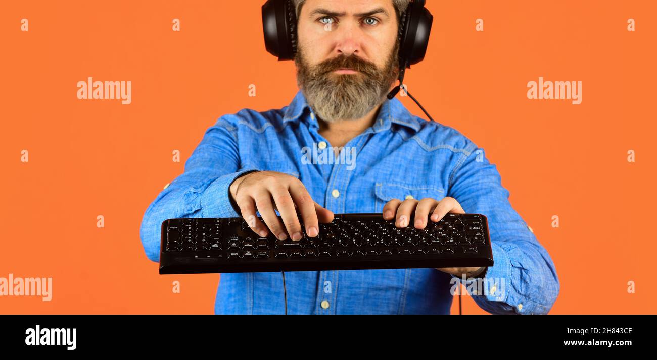 Run any modern game. Play computer games. Man bearded hipster gamer ...