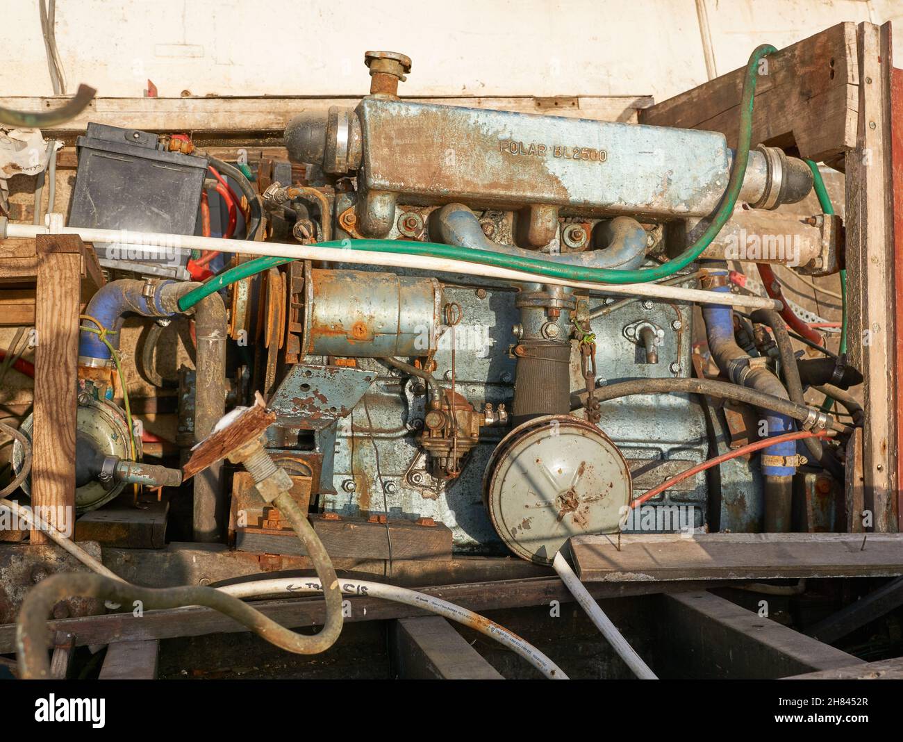 Old rusty boat engine example Stock Photo - Alamy