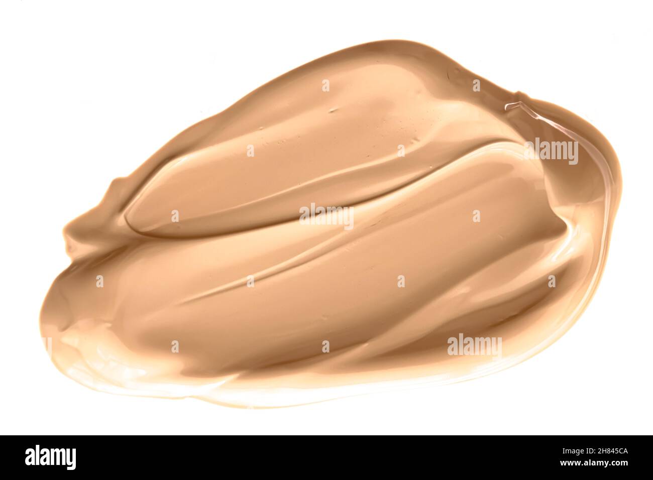 Beige beauty cosmetic texture isolated on white background, smudged ...