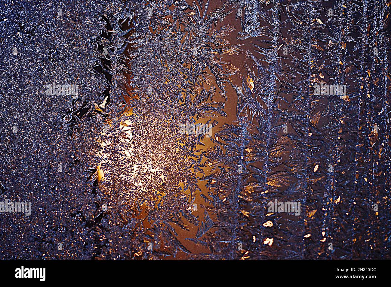 Frozen drops of condensed steam water drops on the transparent window ...