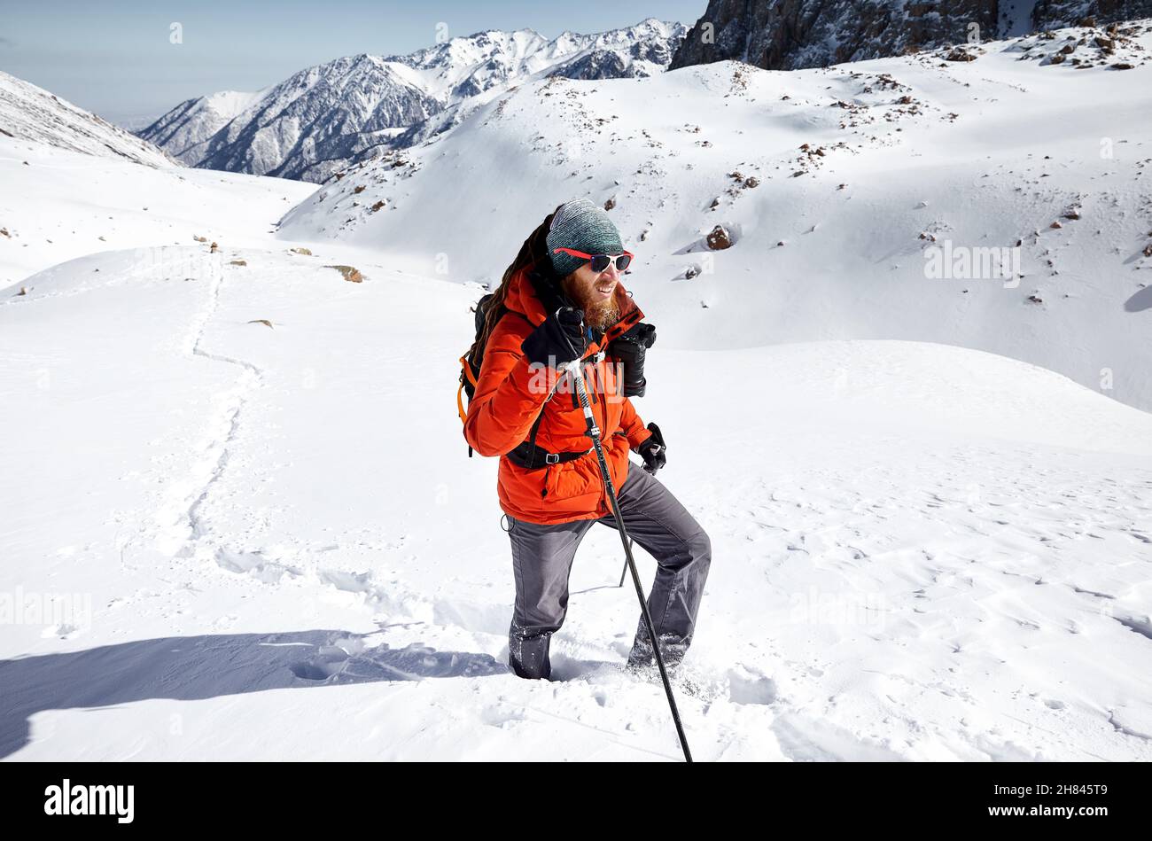 Man climbing hill hi-res stock photography and images - Alamy