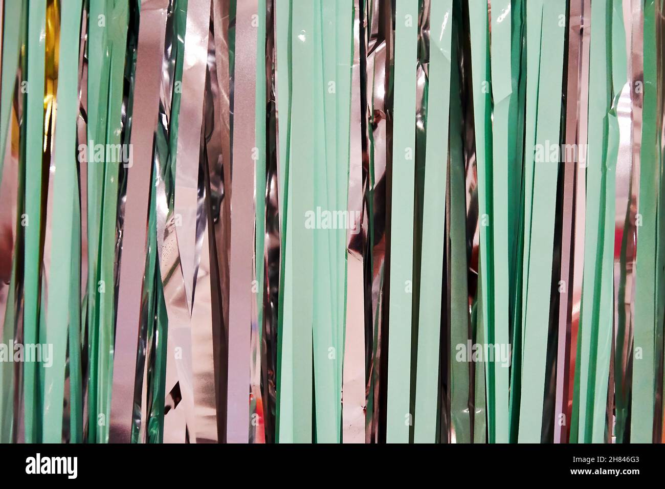 Turquoise foil ribbon background with light reflection. Wrapping paper ...