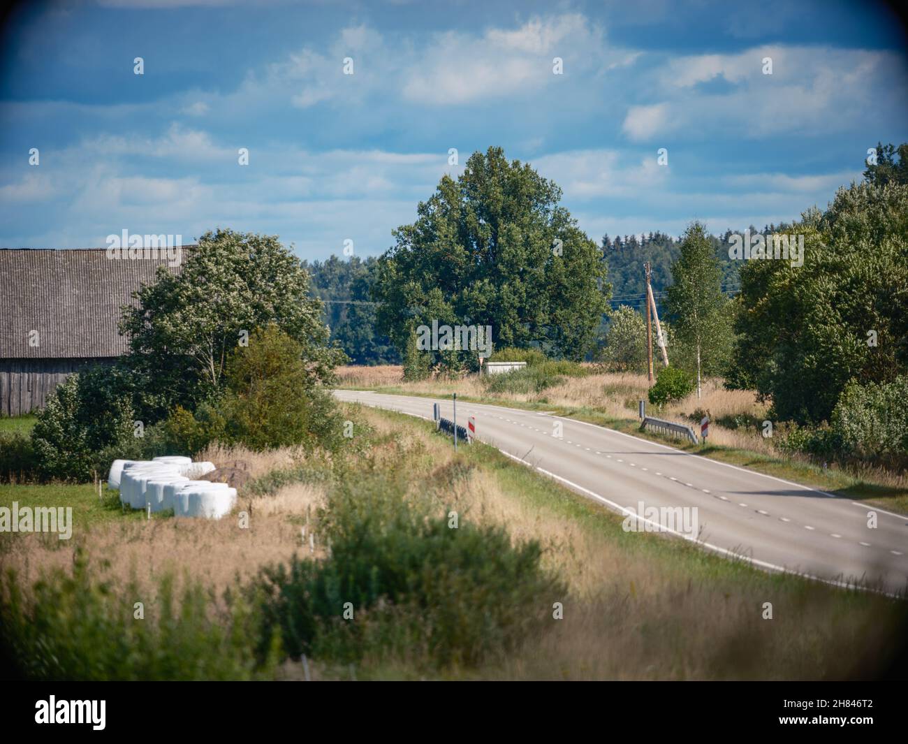 simple asphalt road in perspective with clear direction Stock Photo - Alamy
