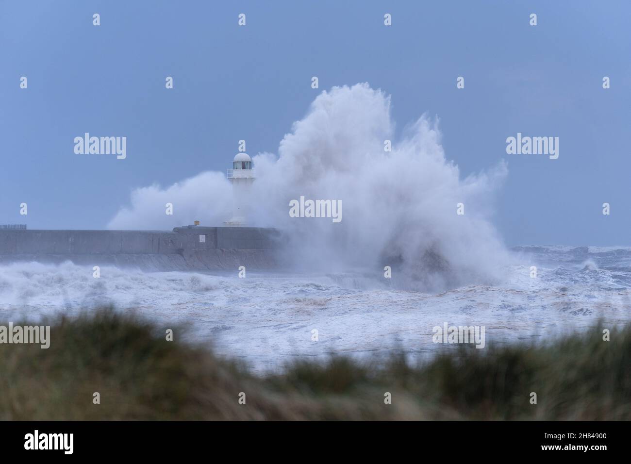 Redcar, UK. 27th Nov, 2021. Huge waves crash over the South Gare ...