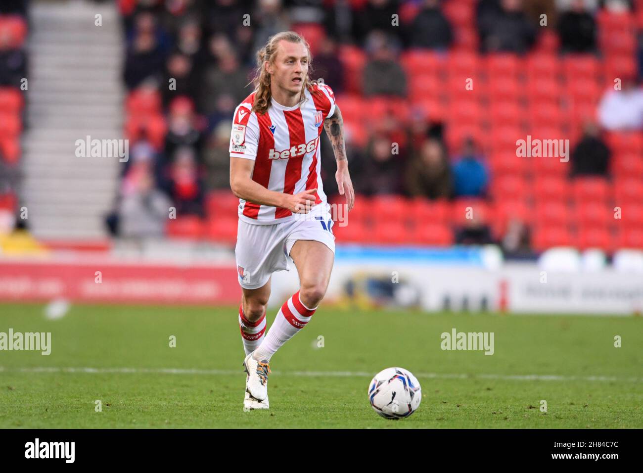 Ben Wilmot #16 of Stoke City runs forward with the ball Stock Photo - Alamy