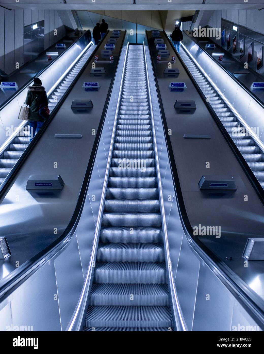 People travelling on the escalators at Battersea Power Station tube ... People travelling on the escalators at Battersea Power Station tube ...
