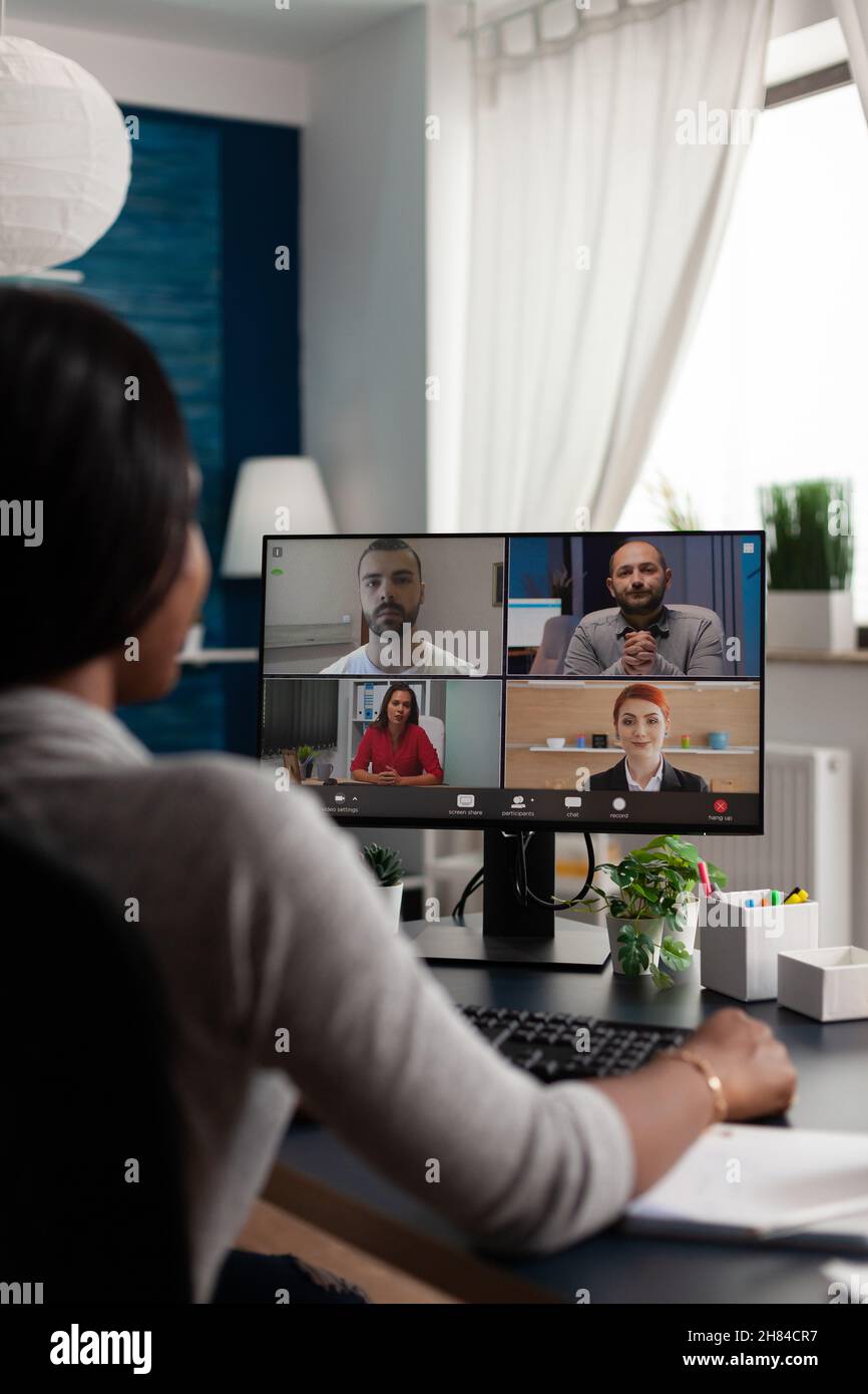 Woman on video call workmates hi-res stock photography and images - Alamy