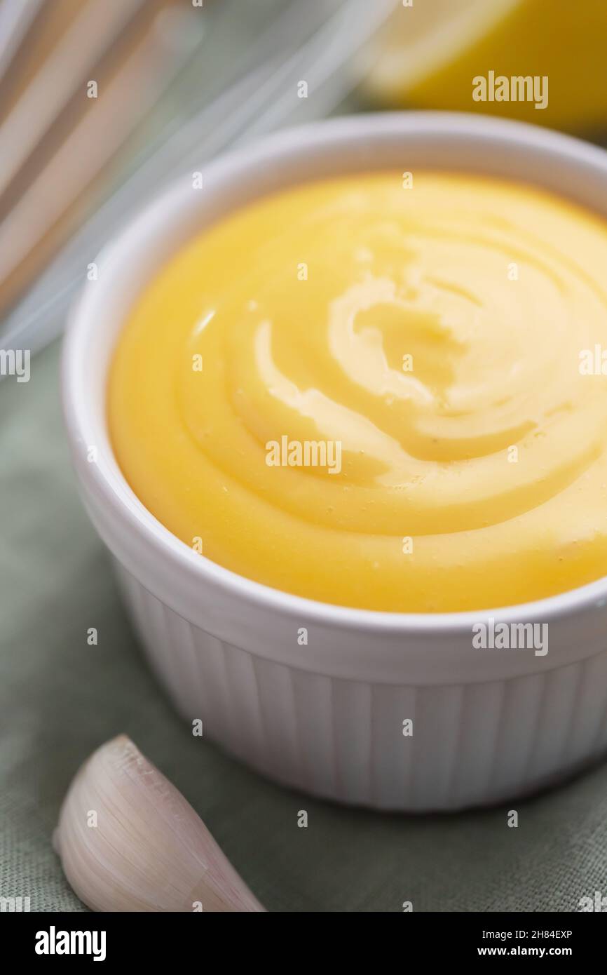 Spanish aioli sauce prepared with garlic, oil and eggs yolk. Aioli is ...