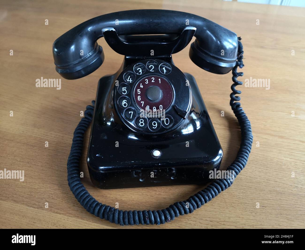 Old black bakelite telephone, retro Stock Photo - Alamy