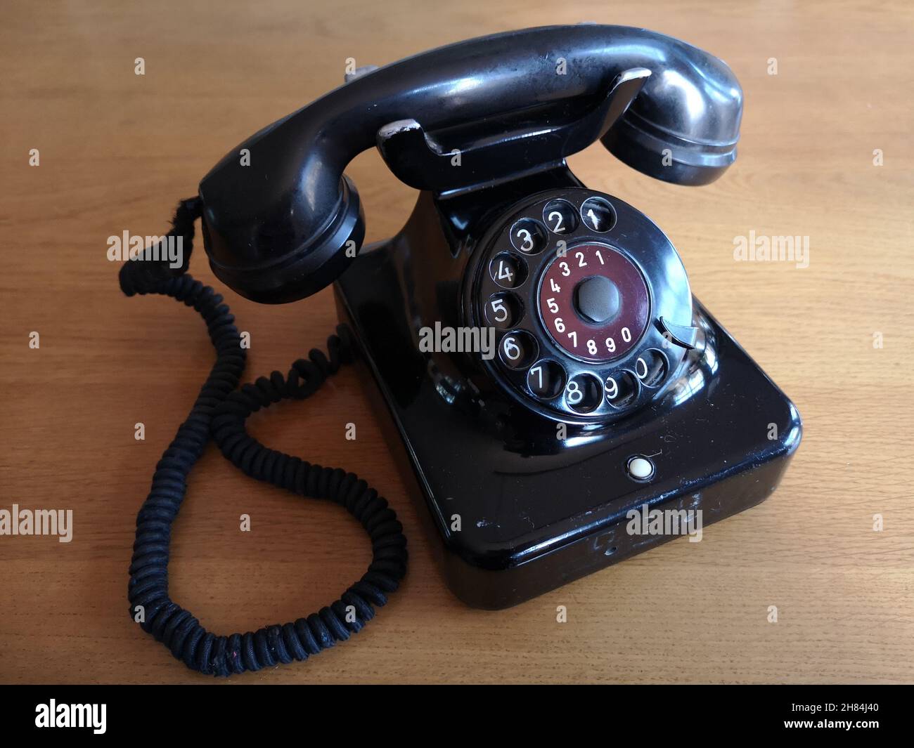 Old black bakelite telephone, retro Stock Photo - Alamy