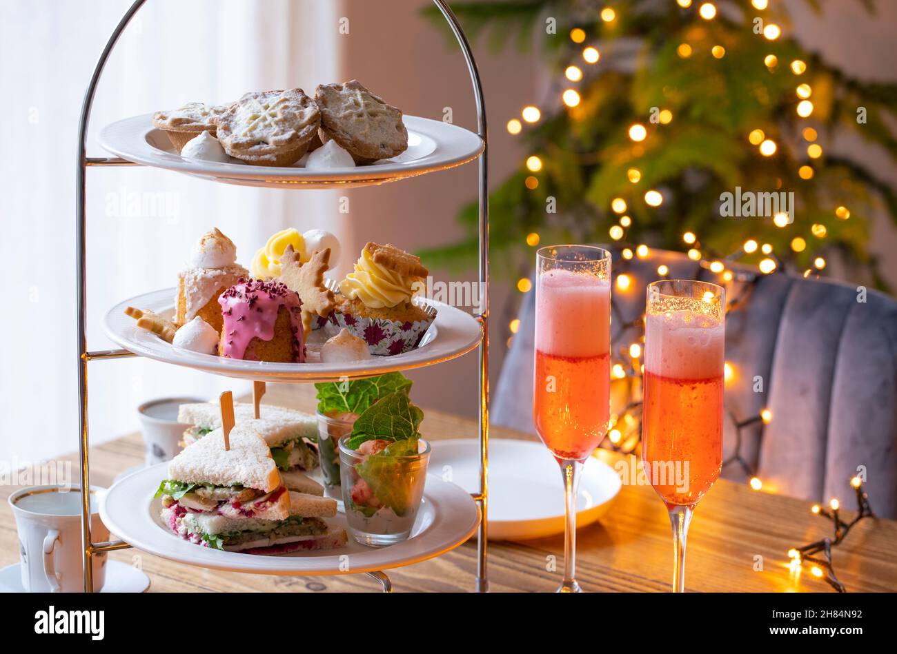 Christmas afternoon tea with mince pies, cakes, turkey sandwiches and ...