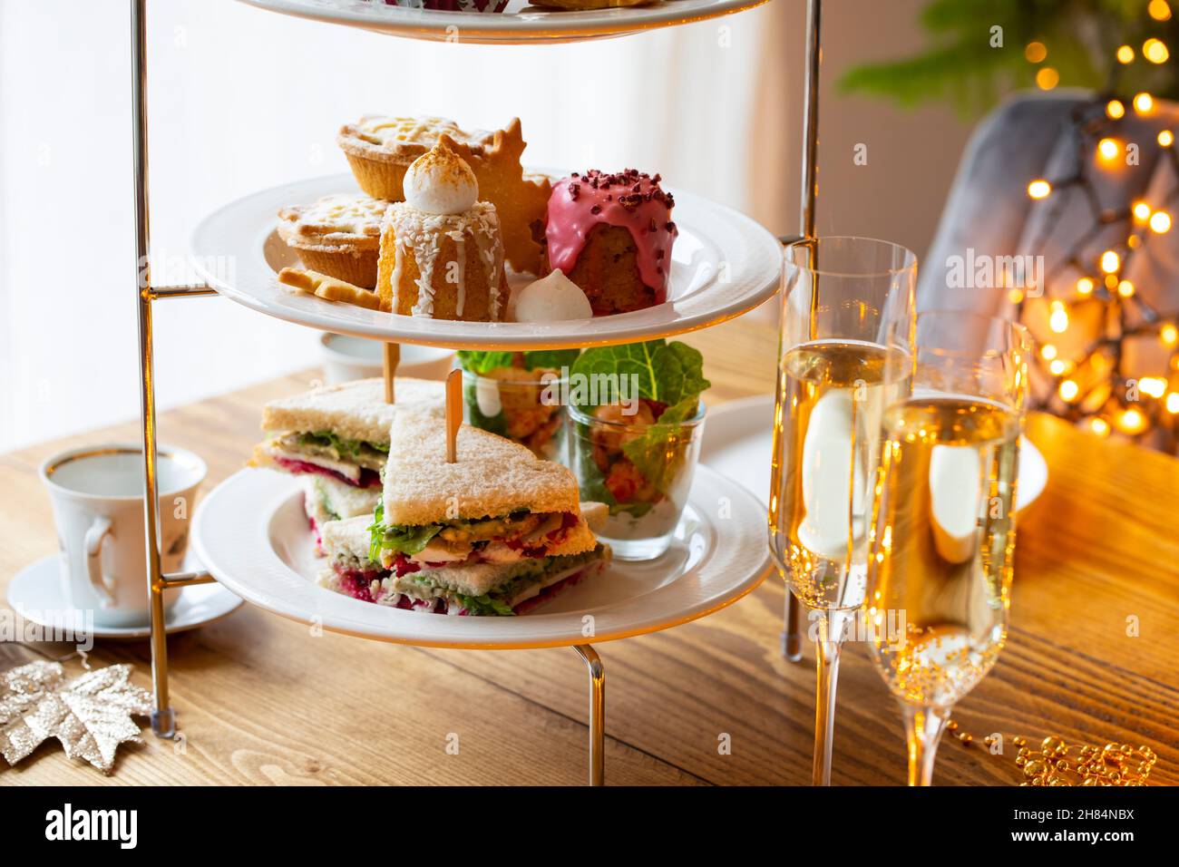 Christmas afternoon tea with mince pies, cakes, turkey sandwiches and ...