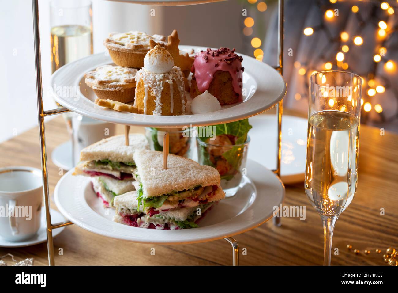 Christmas afternoon tea with mince pies, cakes, turkey sandwiches and ...