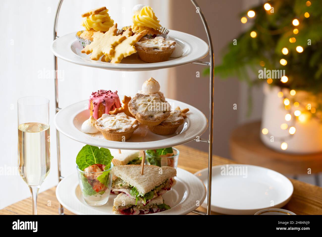 Christmas afternoon tea with mince pies, cakes, turkey sandwiches and ...