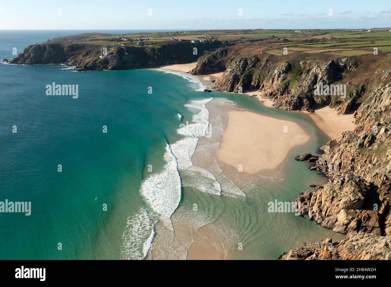 Aerial view of the clear waters of tropical looking Pedn Vounder beach ...