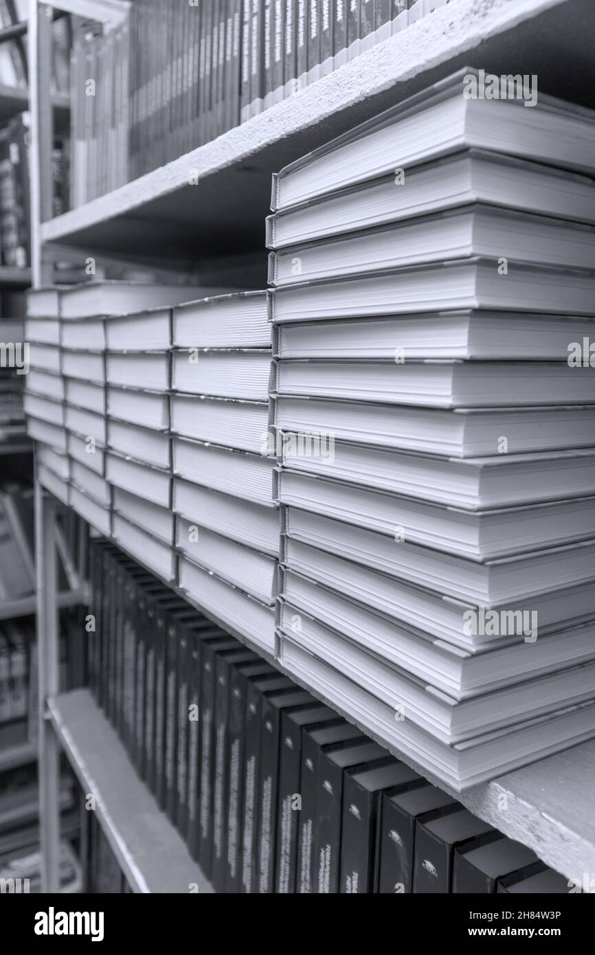 Books on a shelf in the library. Selective focus Stock Photo - Alamy