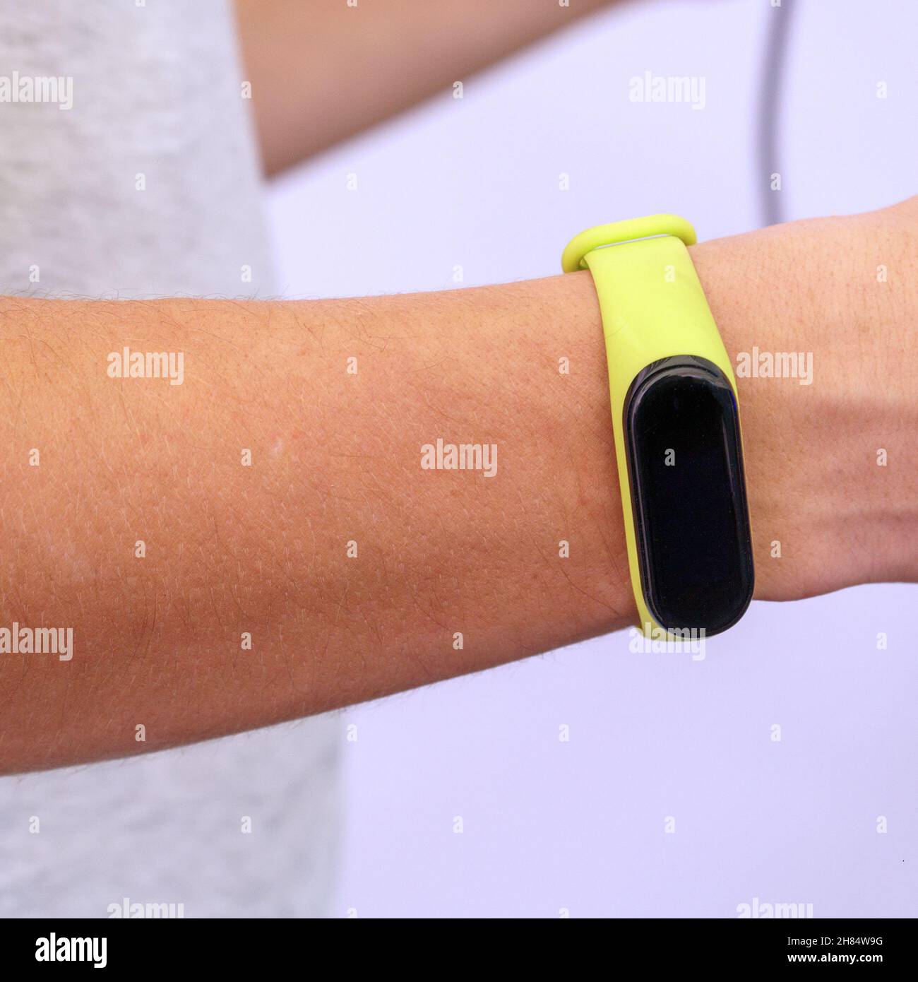 Smart watch with a narrow dark screen on a man's hand Stock Photo - Alamy