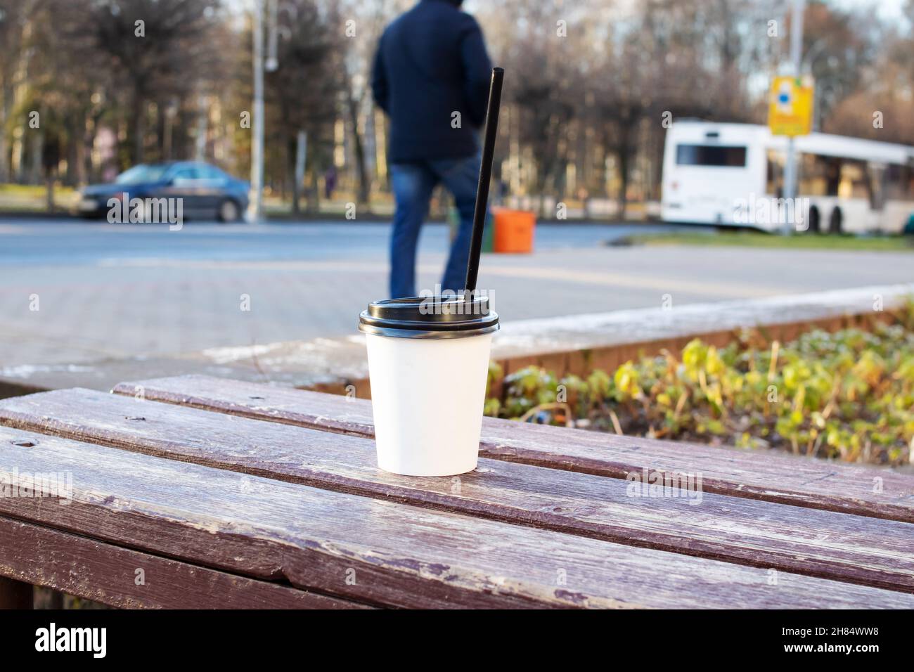 Espresso coffee on a bench in a park hi-res stock photography and ...