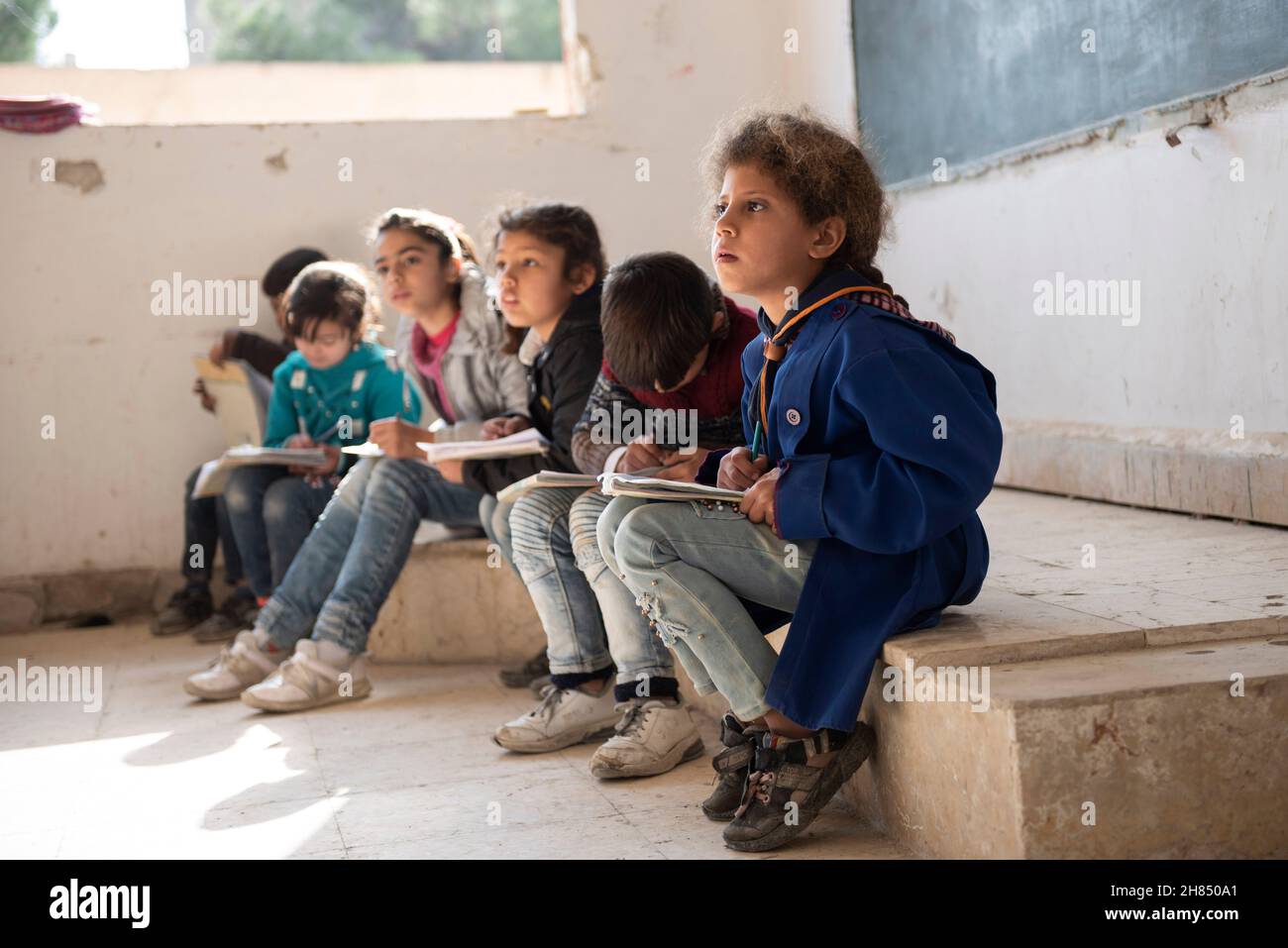 Body diversity in education in Syria after war Stock Photo - Alamy