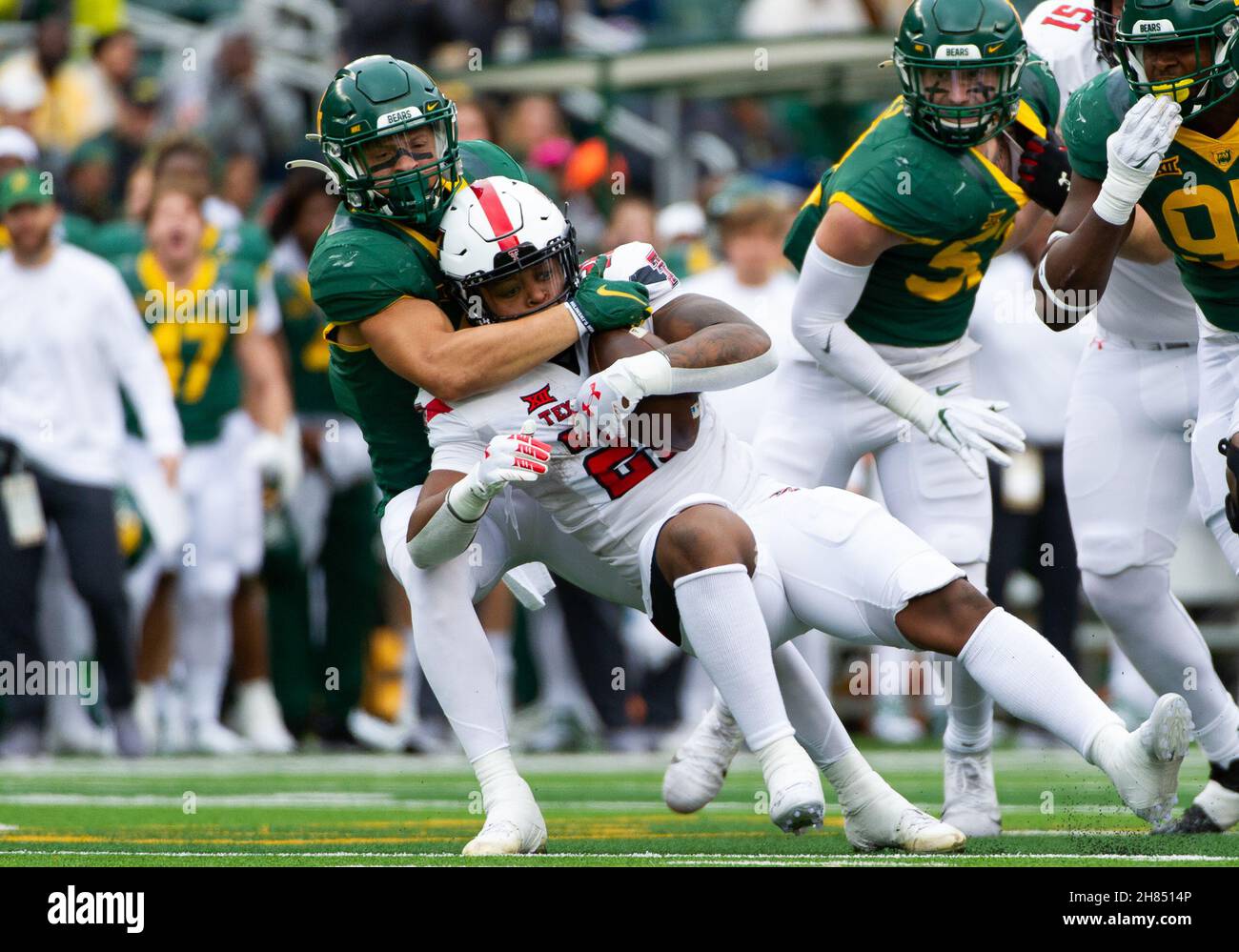 November 27 2021: Baylor Bears linebacker Terrel Bernard (2) tackles ...